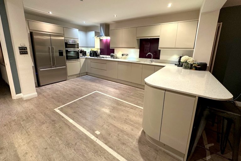 Howdens Kitchen With Quartz Worktops, Breakfast Bar and Some Appliances ...