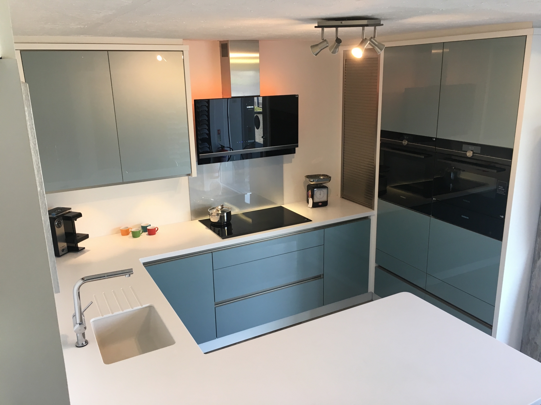 Ex Display Ultra Gloss Metallic Blue Kitchen with Staron Worktops and ...