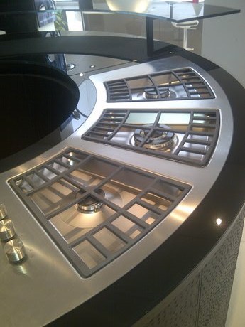 Ex display Pedini Kitchen with Lamborghini finish leather and glass ...